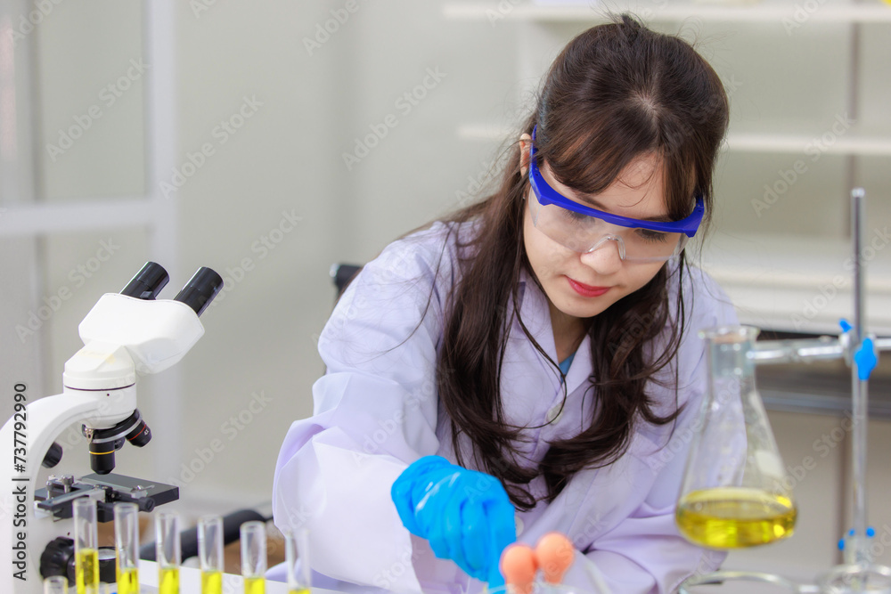 Asian young woman female laboratory professional scientist concentrated ...