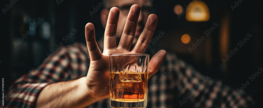 man refuses say no and avoid to drink an alcohol whiskey , stopping ...