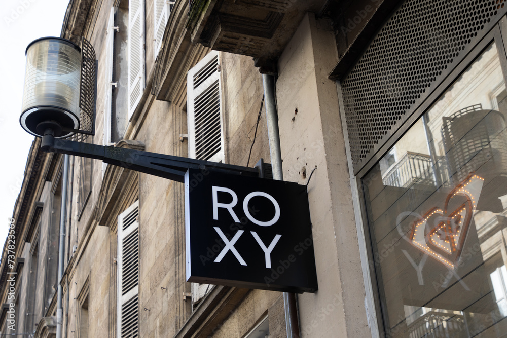 roxy logo text store and sign chain wall of surf brand exterior facade ...