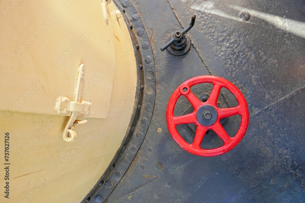 Manual operated valve on a steam ship. Stock Photo | Adobe Stock