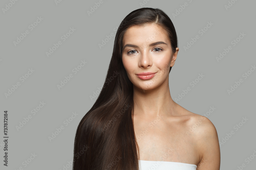 Perfect female model with long perfect hair and clean skin posing on ...