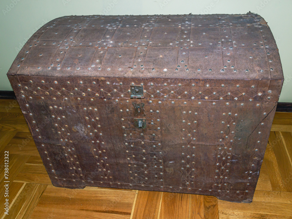 An antique antique chest for storing personal belongings, upholstered ...