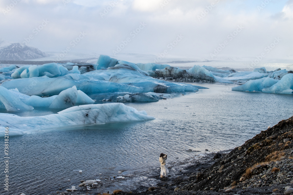 Iceland Tourist shot picture and selfies observing blue glacial ice in ...