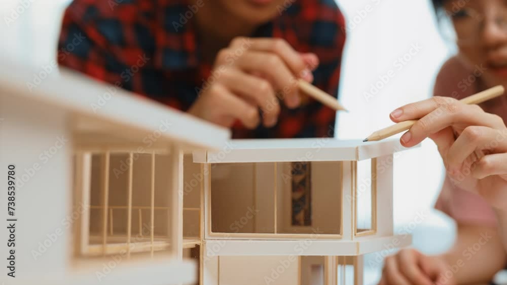 Slow motion home designer using architectural equipment review and ...