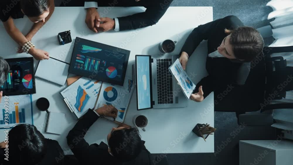 Top down aerial view of smart project manager present growth graph ...