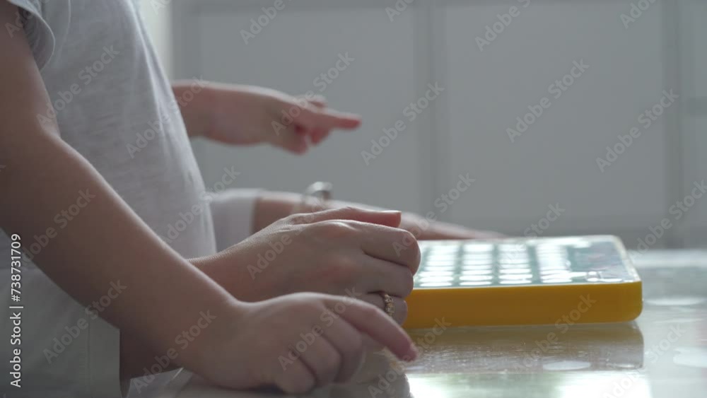 mother and child learning alphabet on smarty alphabet tablet to learn ...