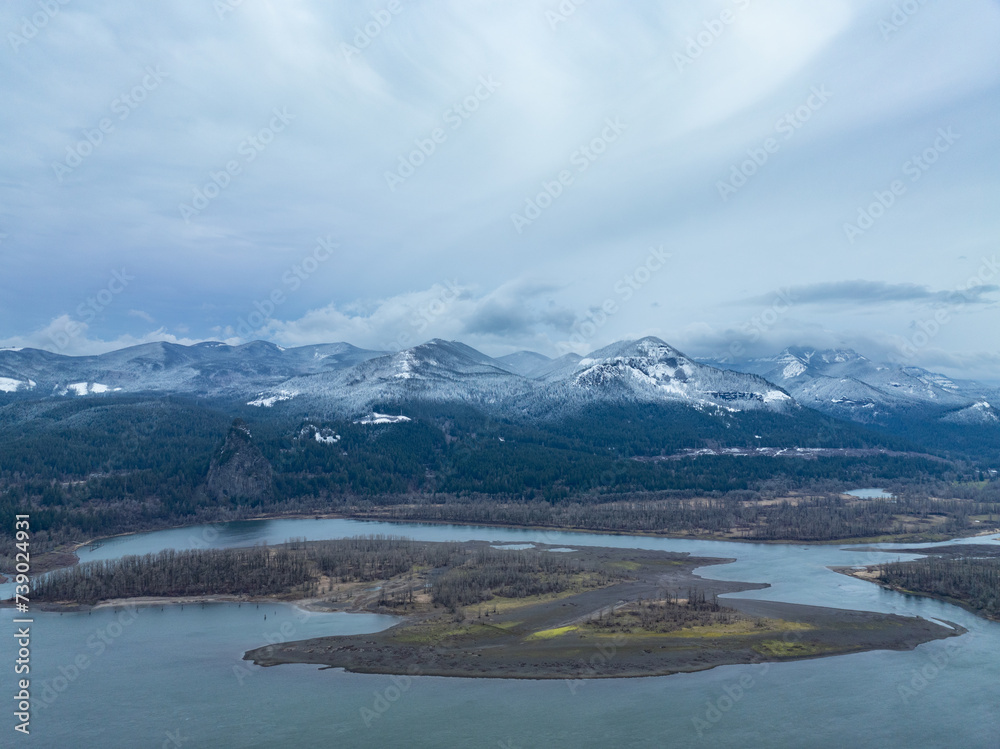 Snow covers the rugged mountain landscape in the Columbia River Gorge ...