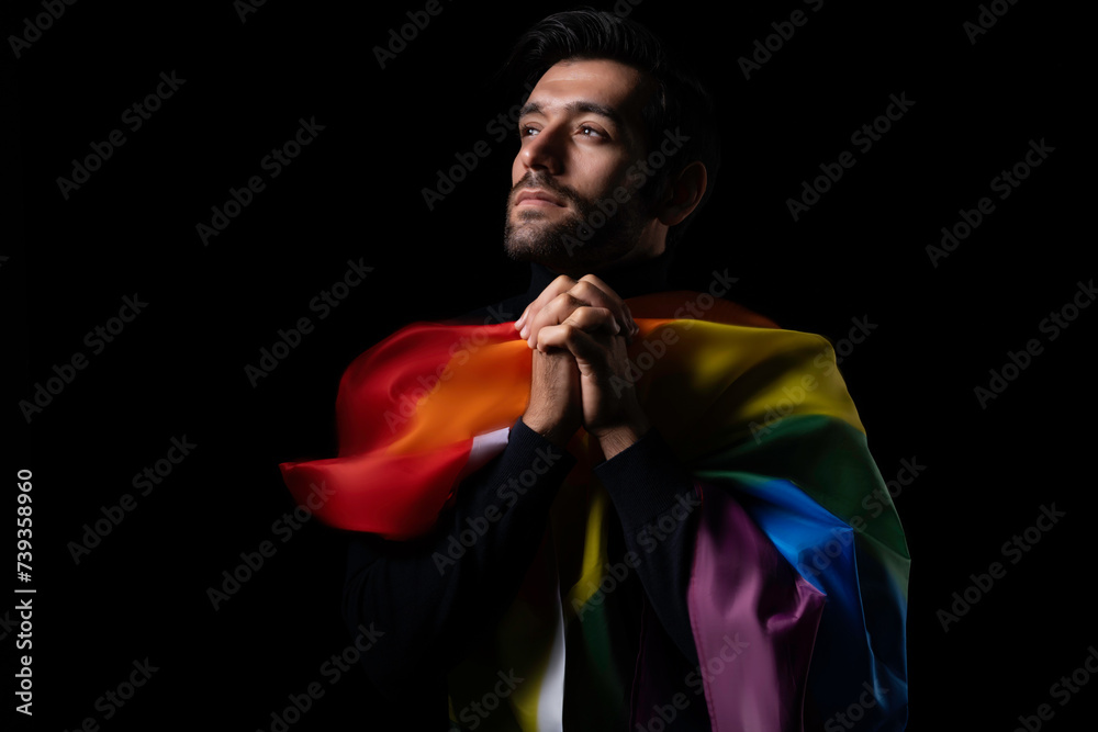 LGBTQ Gay man praying for equal rights Rainbow flag gay pride flag He ...