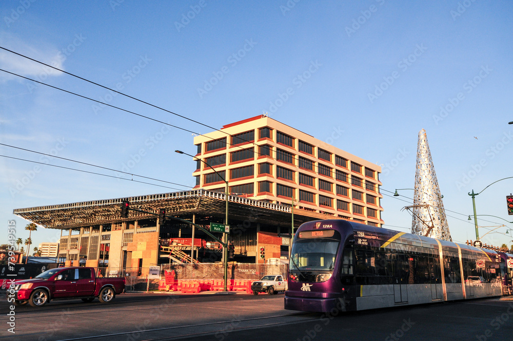 An eastbound Valley Metro Rail vehicle travels on Main Street in ...