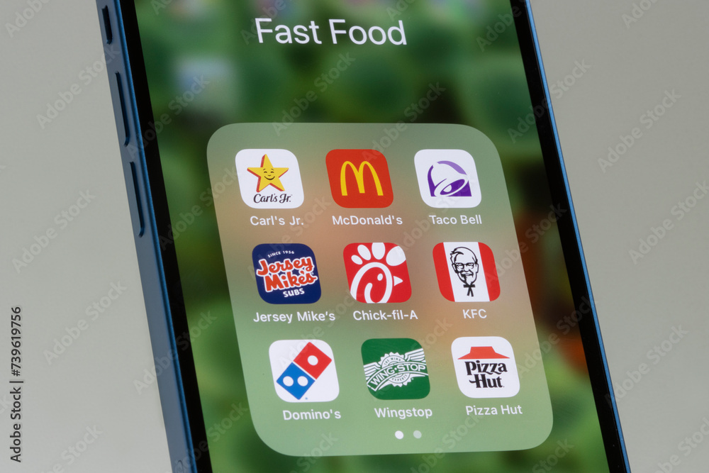 Portland, OR, USA - Feb 14, 2024: Assorted fast food apps are seen on ...