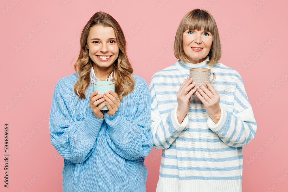 Elder fun parent mom 50s year old with young adult daughter two women ...