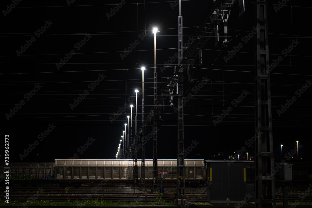 Freight station at night in Zurich, Spreitenbach. Freight trains are ...