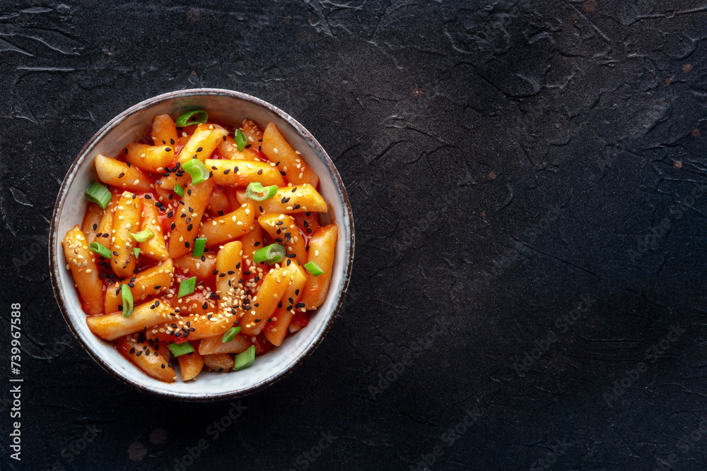 Tteokbokki or topokki, Korean street food, spicy rice cakes in red ...