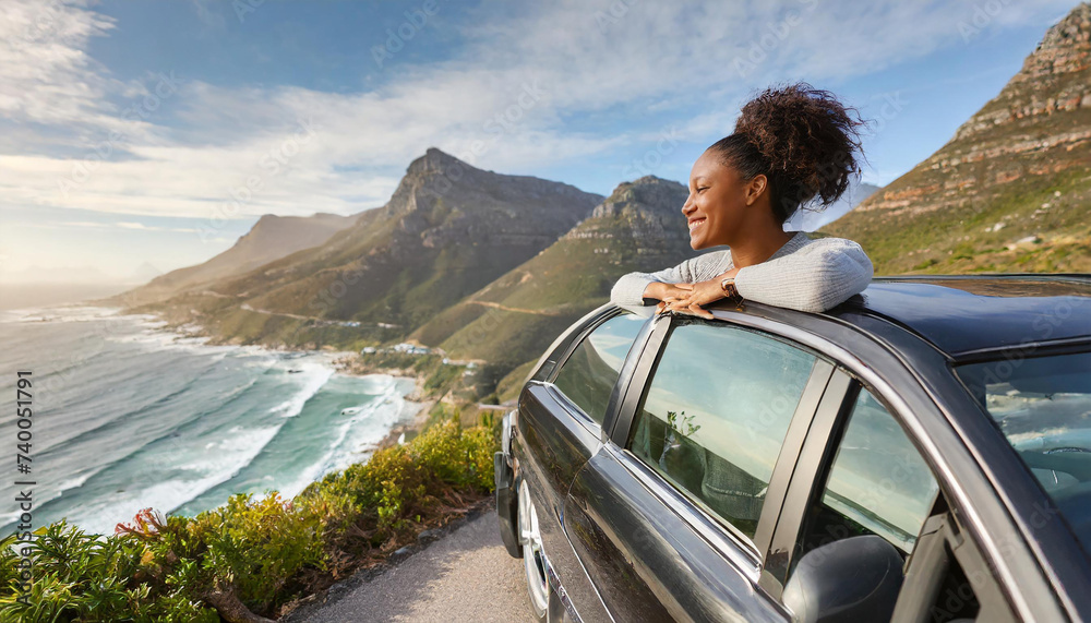 woman outside a car window with hands up, a car at Chapman's Peak Drive ...