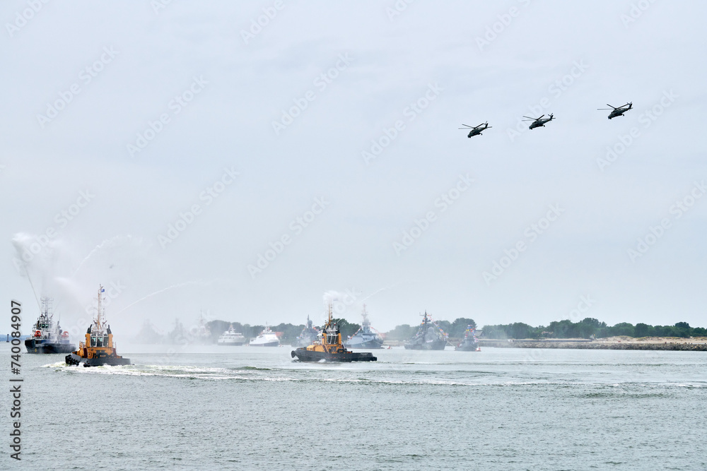 Fireboat sailing along Russian naval forces parade warships with ...