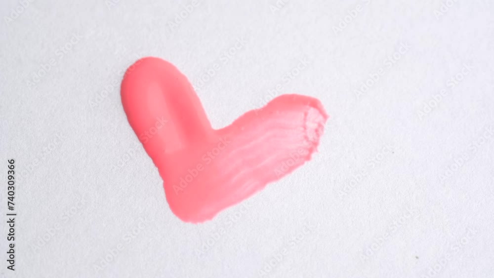 Vidéo Stock Cosmetic liquid lip gloss, lipstick smudge of peach fuzz ...