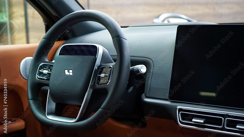 Interior of a car detail SUV Lixiang L9 luxury. Dashboard, steering ...
