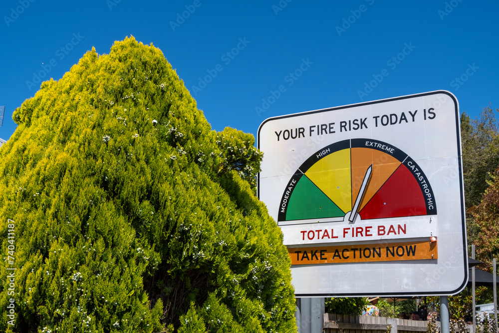 A sign of updating fire danger rating with the arrow pointing at ...