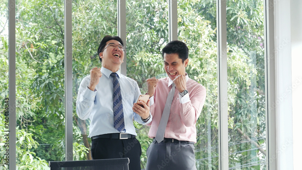 Success Businessman happy got good news mobile smartphone. Excited two ...