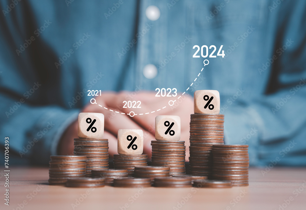 Coins stacking with percentage sign and increasing graph since 2021 ...