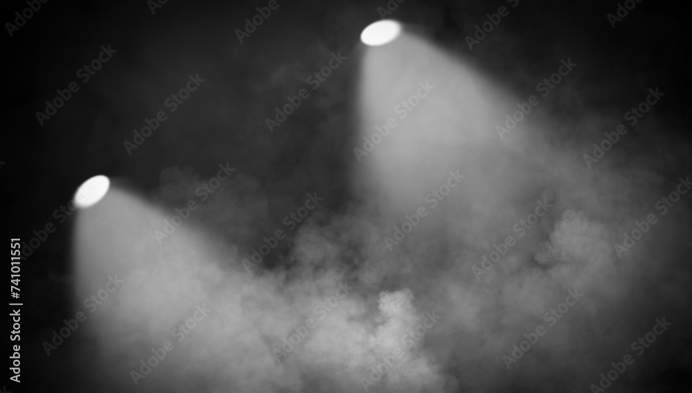 Divine light through a dark fog. The rays beam light on the floor ...