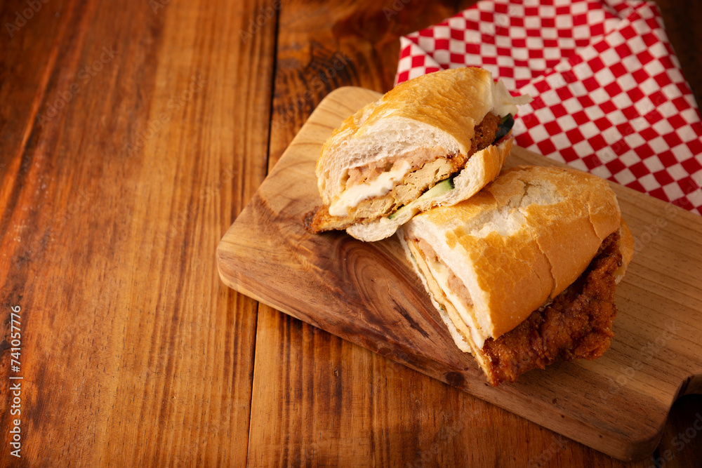 Mexican Torta de Milanesa. Sandwich made with bolillo bread, telera or ...