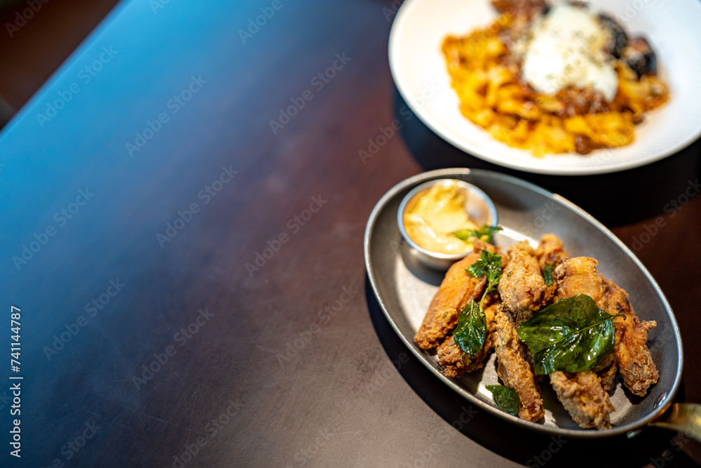 Eggplant pasta, onsen eggs, spiced chicken wings, fried food ...