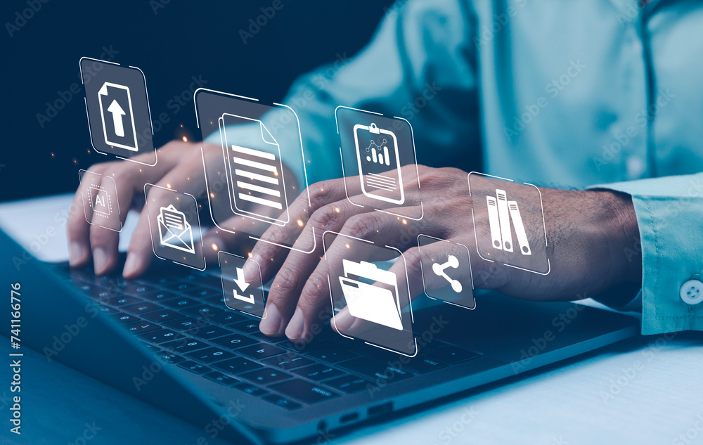 Hands engage with a virtual interface laptop, showcasing data ...