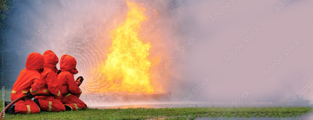 Firefighter Rescue training in fire fighting extinguisher. Firefighter ...
