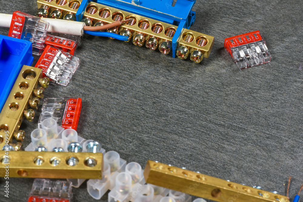 Various electrical terminal blocks, wiring connectors on the gray ...