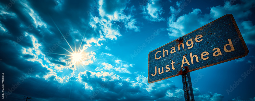 Inspirational Change Just Ahead road sign against a vibrant blue sky ...