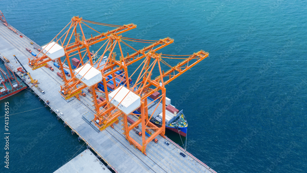 cargo container ship under big crane loading box container at Shipyard ...