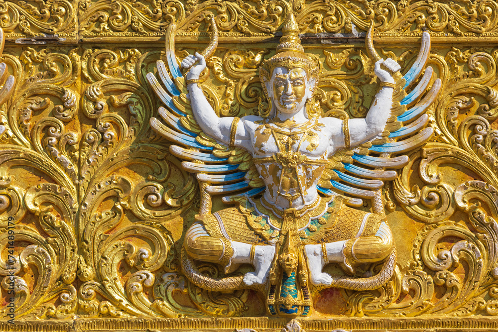 Pattaya, Thailand - 22 December, 2023: Gold-white bas-relief of Garuda ...