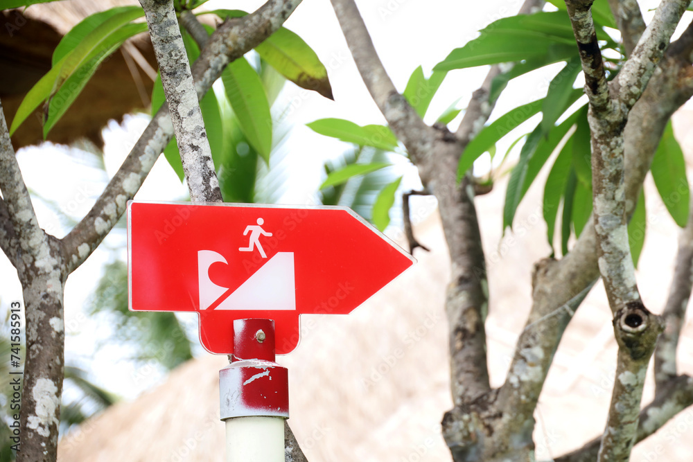 tsunami warning signs that show the direction of the evacuation route ...