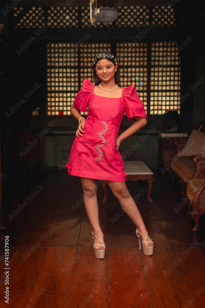 Full body photo of a radiant young Filipino lady confidently modeling a ...