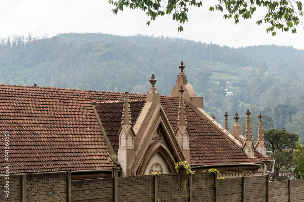 The roof and spires of the old Union Church overlooking the Nilgiri ...