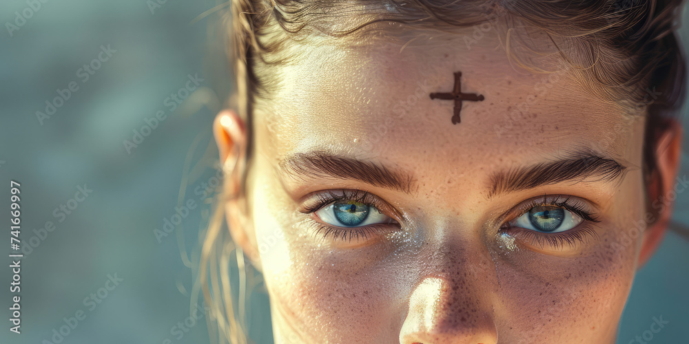 Young Woman with Ashen Cross, copy space, portrait. Close-up of a ...