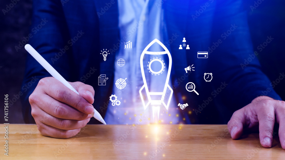 Startup business concept, rocket launching and flying from hand to sky ...