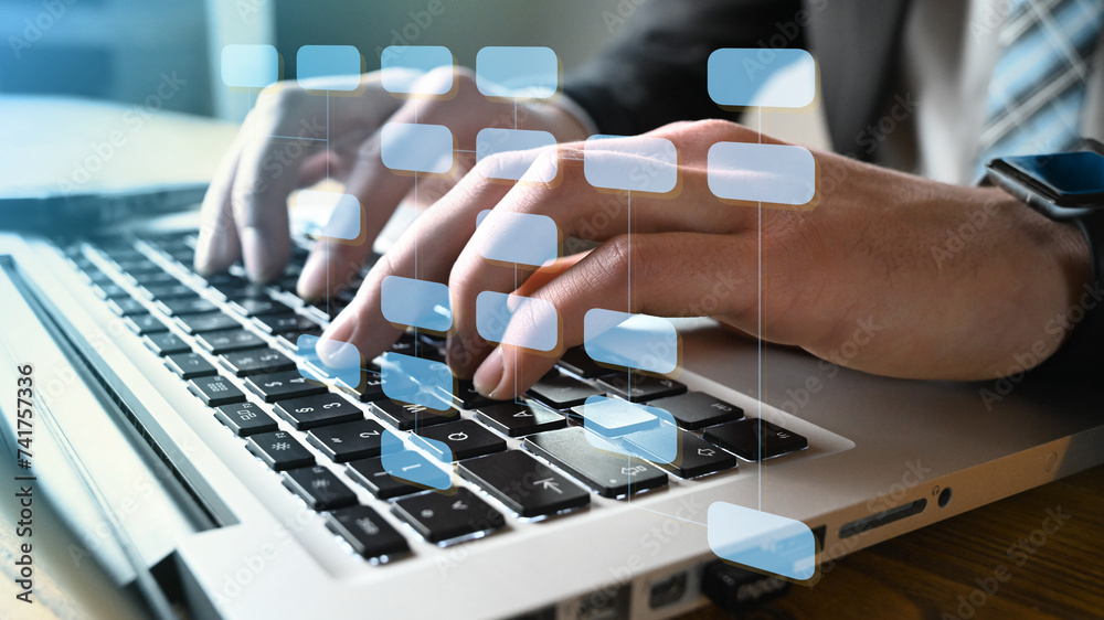Businessman with a suit and laptop working on a business flowchart in ...