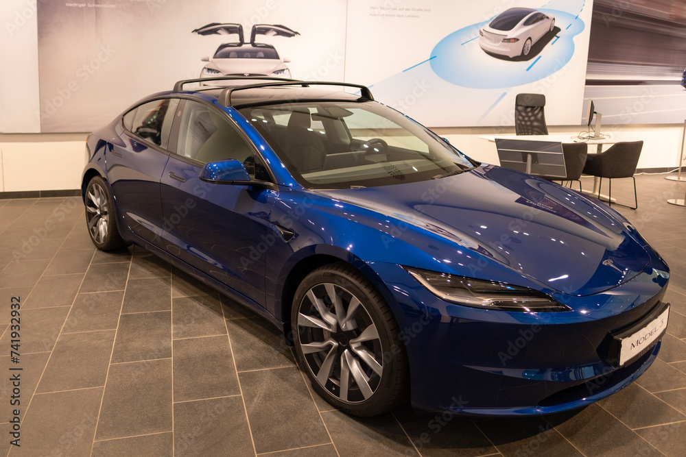blue Tesla Model 3 Highland facelift electric car in Studio, eco ...