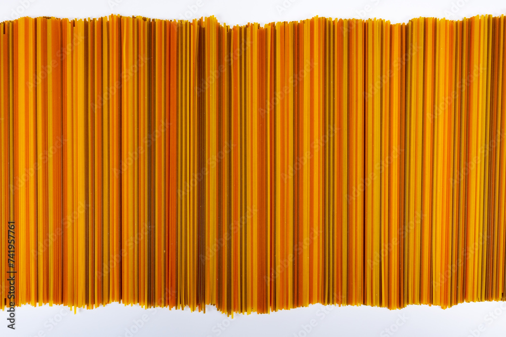 Food background, colorul dried pasta spaghetti, paralleled lines ...