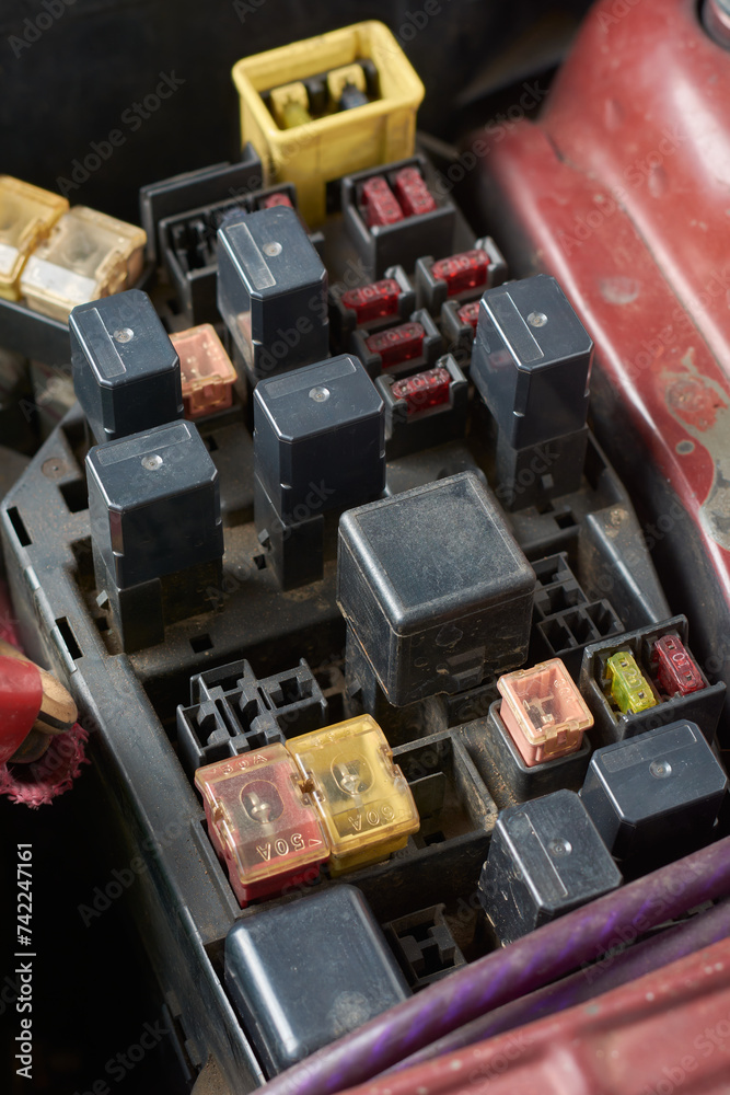 fuse box, panel or block in a car, located in engine compartment ...