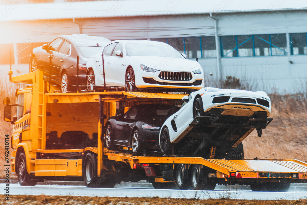 Car carrier trailer truck with brand new exotic luxury sport cars for a ...