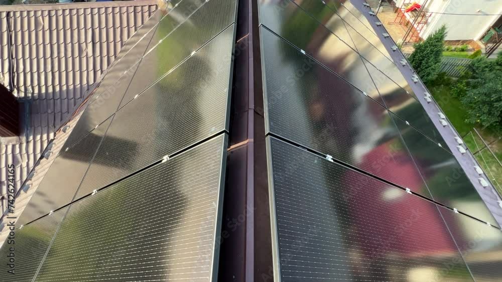 Solar photovoltaic panel system on modern house rooftop. Solar ...