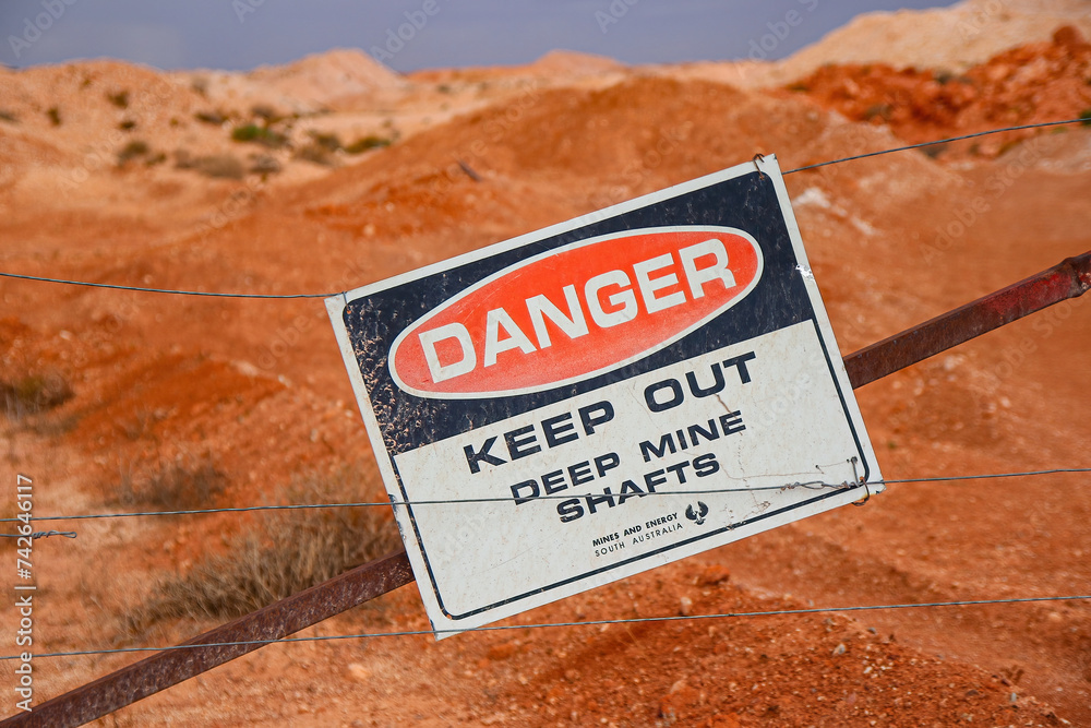 Danger sign outside Tom's Working Opal Mine in Coober Pedy, South ...