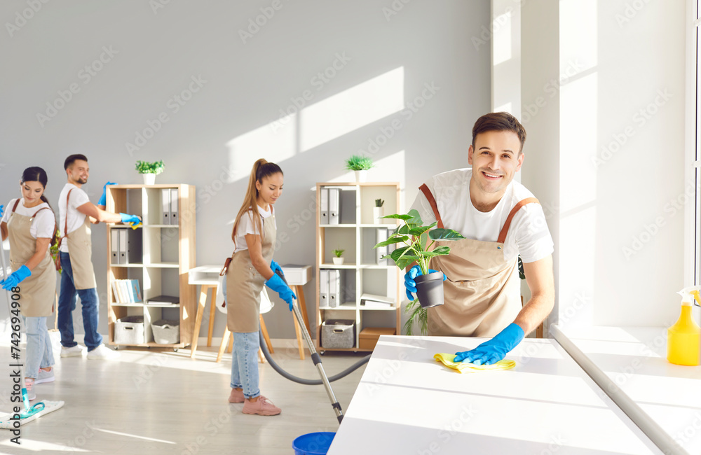 Team of male and female cleaning service household cleaners employees ...