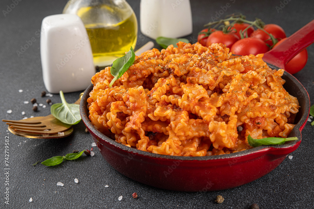 Mafaldine pasta with tomato sauce, italian bolognese, tomato marinara ...
