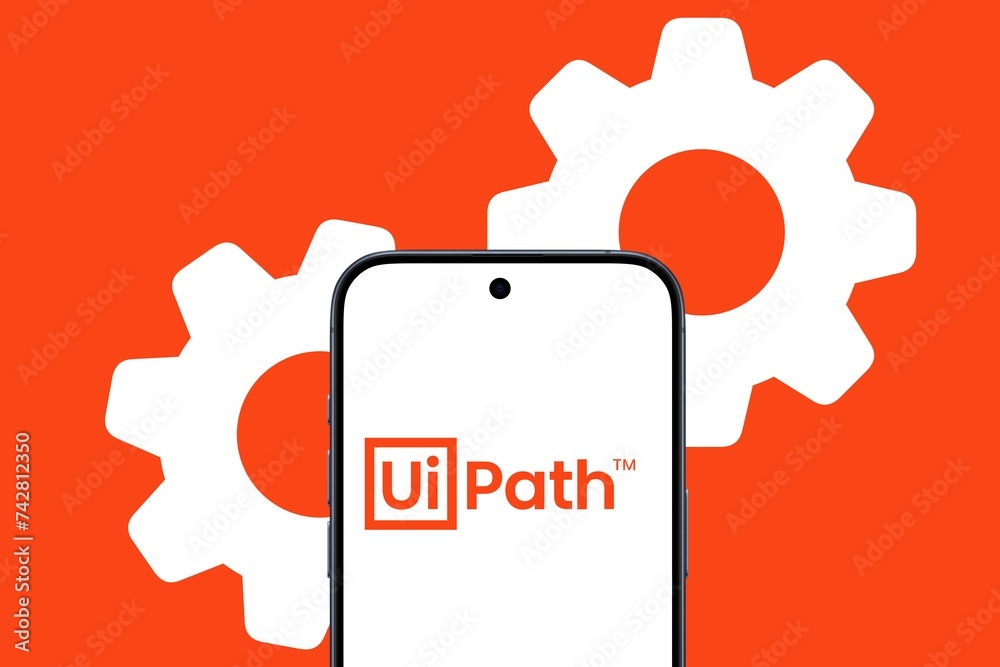 UiPath Logo is displayed on a modern smartphone, software company for ...
