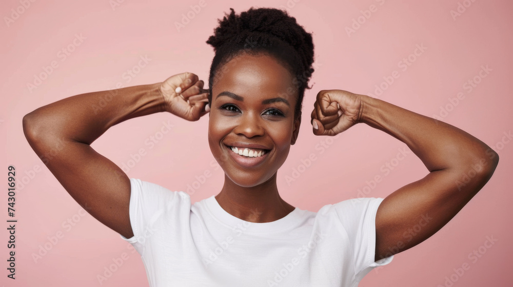A happy person flexing their muscles in a display of strength and ...