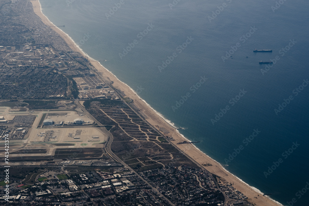 Aerial view of the shoreline of Los Angeles, with a view of the runways ...